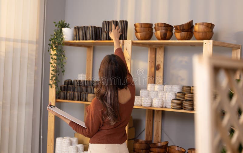 An Owner of Vase Brand Checks Online and Physical Inventory and ... An Owner of Vase Brand Checks Online and Physical Inventory and ...