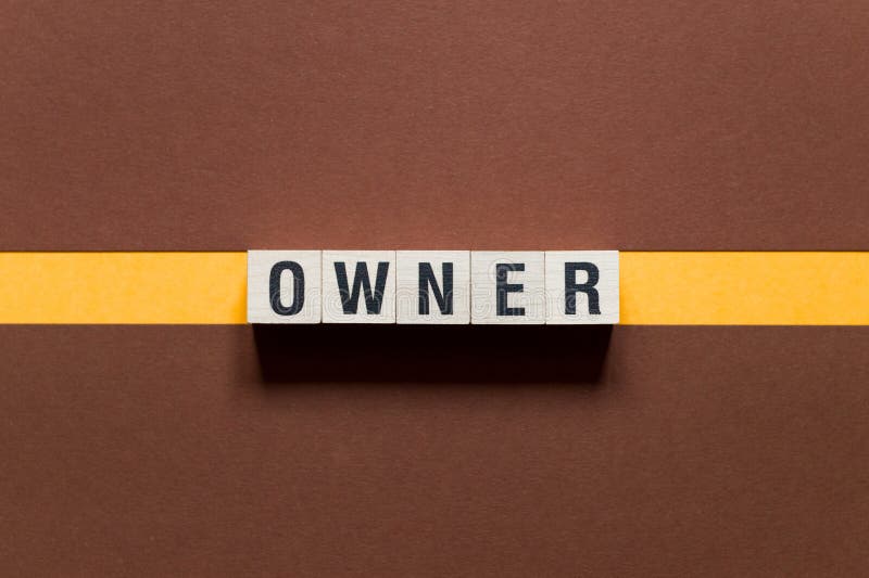 Owner Word on Wooden Blocks on Red. Ownership Business Concept Stock ...