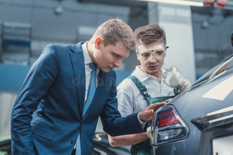 Owner and worker stock photo. Image of businessman, servicing - 88760348