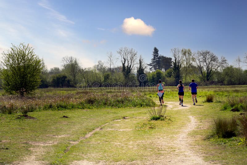 Three Runners on the Thames Path Editorial Photography - Image of ...