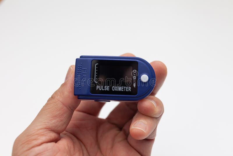 Oximeter in a Man`s Palm. Oxygen Meter Stock Photo - Image of heartbeat ...