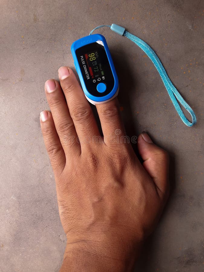 Oximeter To Measure Oxygen Saturation in Body. Stock Photo - Image of ...