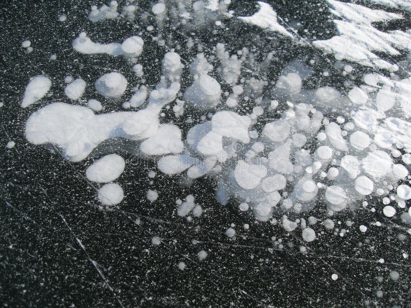 Oxygen bubbles in the ice stock photo. Image of water - 202179594