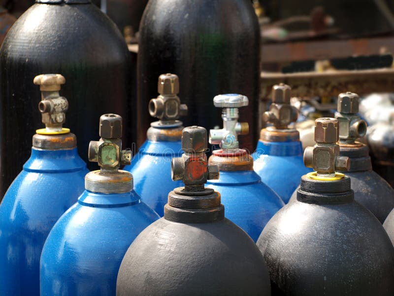 Oxygen and Gas Cylinders stock image. Image of compressed - 24287241