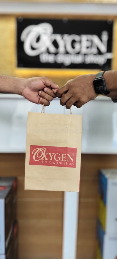OXYGEN Paper Bag Hand Overing Editorial Photography - Image of paper ...
