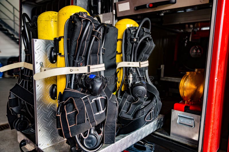 Firefighter With Oxygen Cylinder On The Fire Truck Stock Image - Image ...