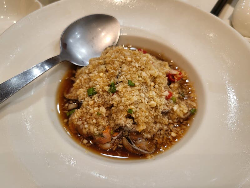 Oysters Cooked with Garlic and Chilli Stock Photo - Image of soup, fish ...