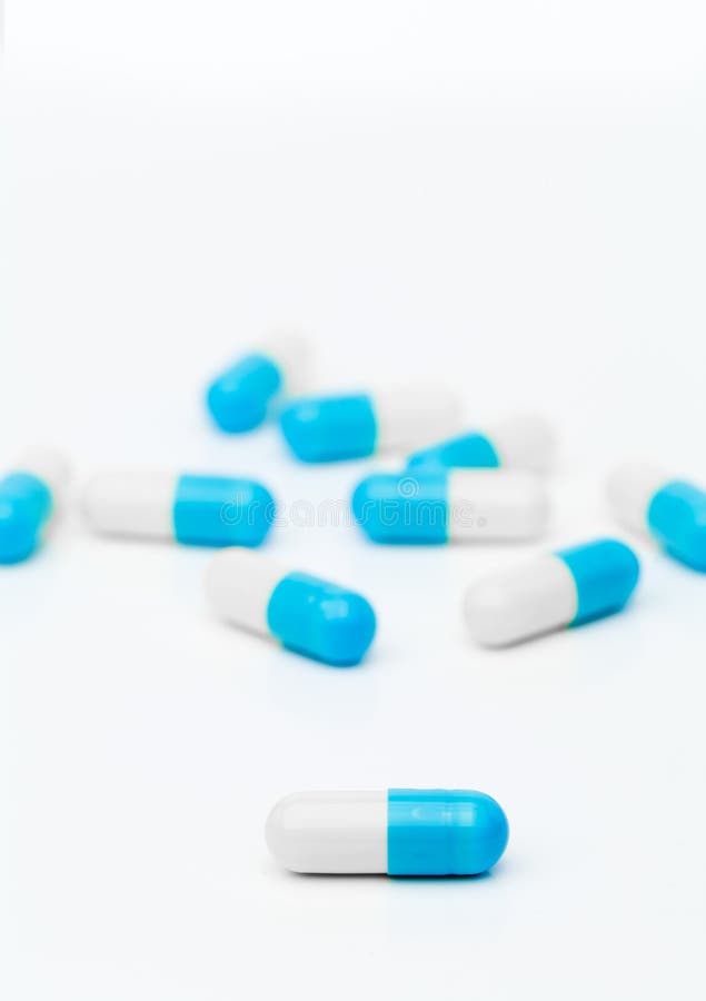 Píldoras Azules De La Droga En El Fondo Blanco Foto de archivo - Imagen ...