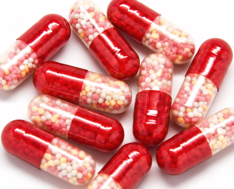 Píldoras rojas foto de archivo. Imagen de primer, color - 36691682