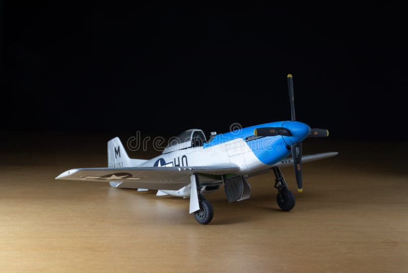 P-51 Scale Aircraft Model Over Wood with Black Background Stock Image ...