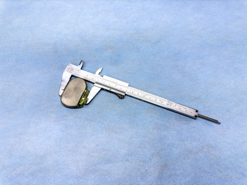 A Pacemaker is Measured with a Measuring Gauge Stock Image - Image of ...