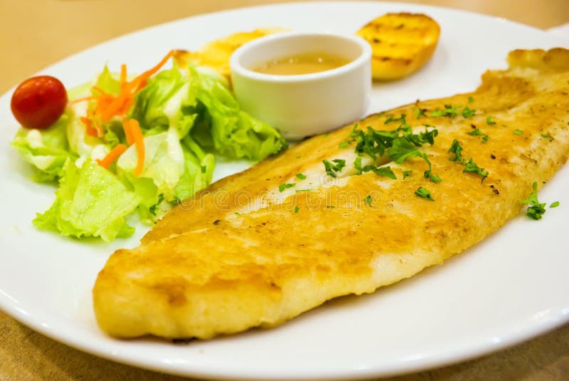 Pacific Dory Fish Steak with Salad Stock Photo - Image of portion, food ...