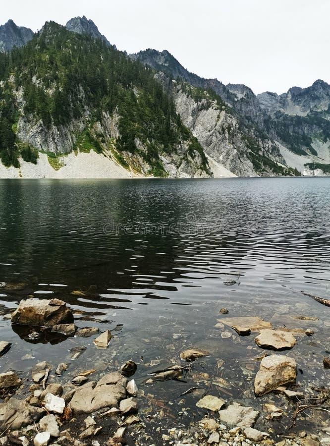 Lake stock image. Image of pristine, rocky, steep, mountains - 157115069