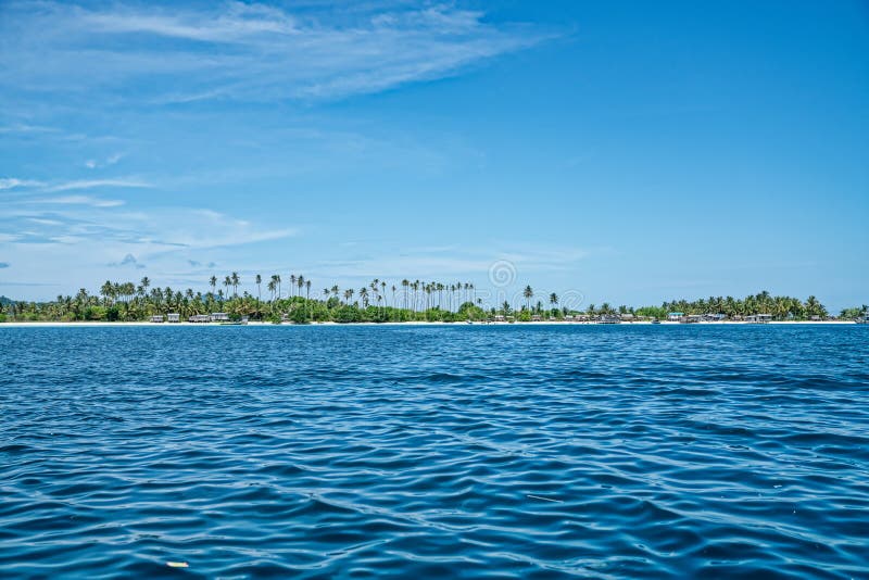 Pacific Ocean Divided by Idyllic Tropical Island Under Blue Sky Stock ...