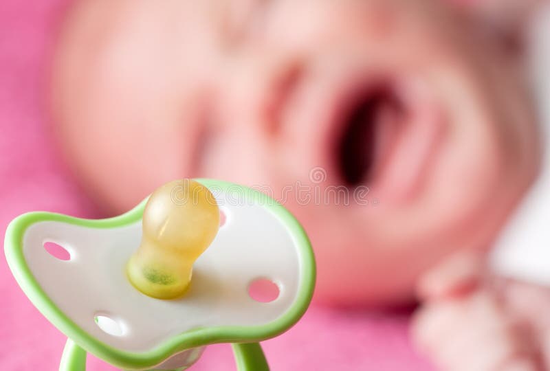 Pacifier Against Crying Baby Stock Photos - Free & Royalty-Free Stock ...