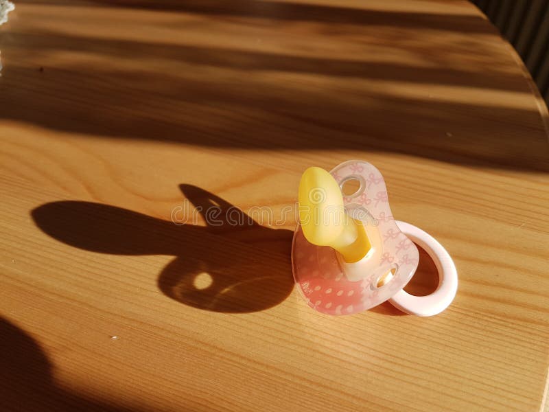 Pacifier Red on Wooden Table Stock Photo - Image of dummy, newborn ...