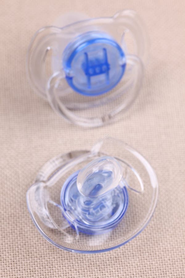 Pacifiers stock photo. Image of dark, pacifier, blue - 44664500