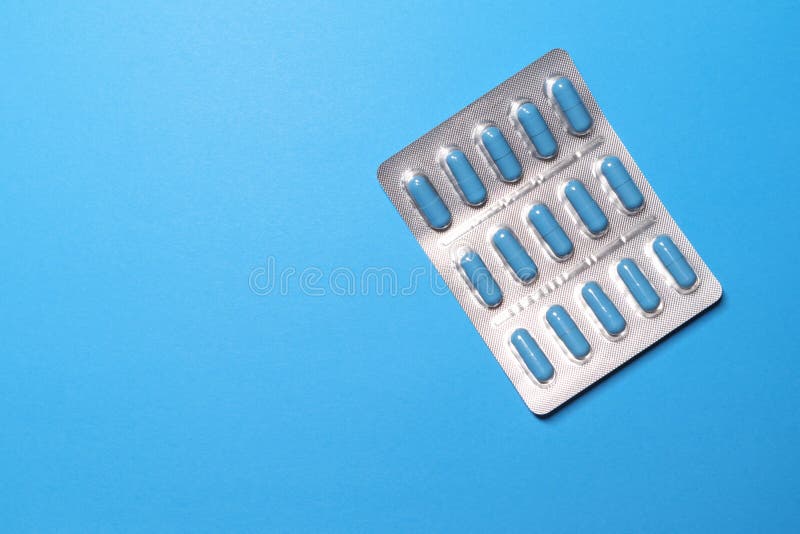 Pack of Blue Medicine Tablets Stock Photo - Image of medication, dose ...