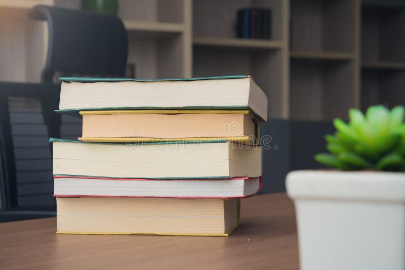 Pack of Book Stack on Table in Working Room at Office Stock Photo ...