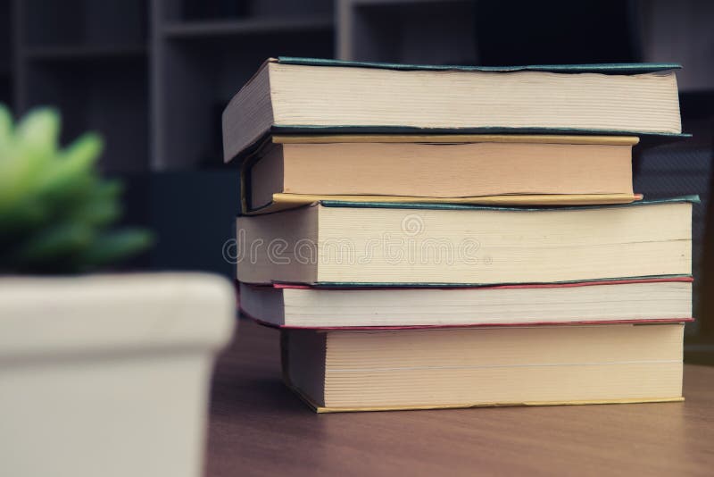 Pack of Book Stack on Table in Working Room at Office Stock Image ...