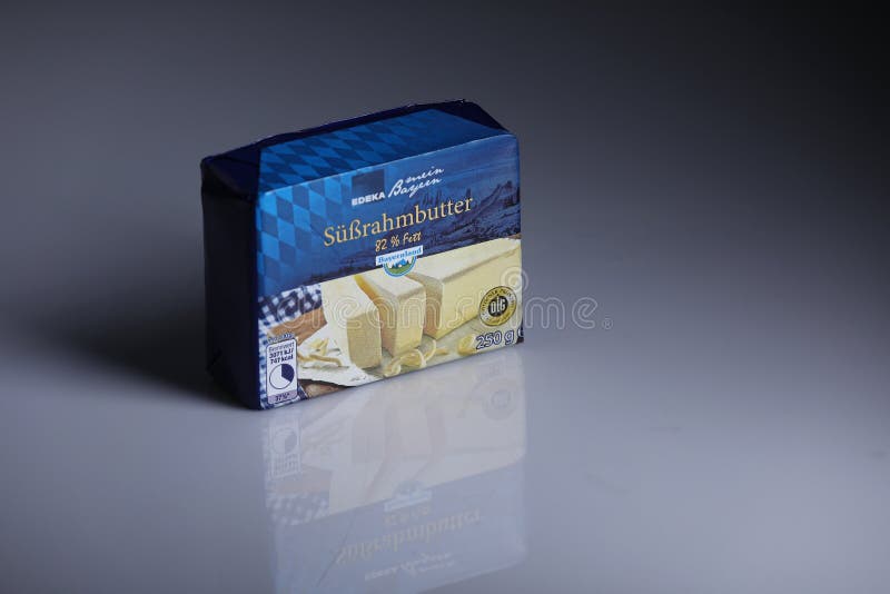 Pack of Butter in a Butter Dish Stock Photo - Image of package, yellow ...