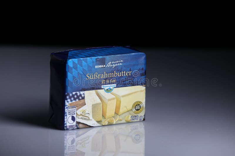 Pack of Butter in a Butter Dish Stock Photo - Image of package, yellow ...