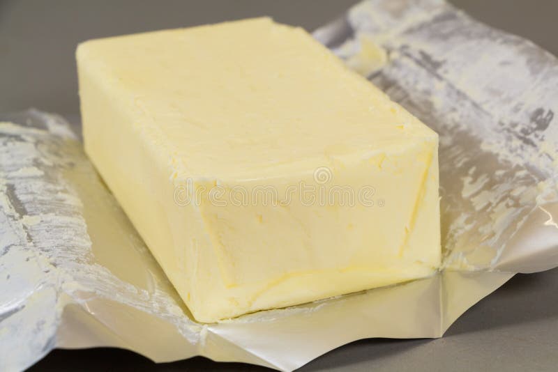 Pack of Butter in a Butter Dish Stock Photo - Image of package, yellow ...