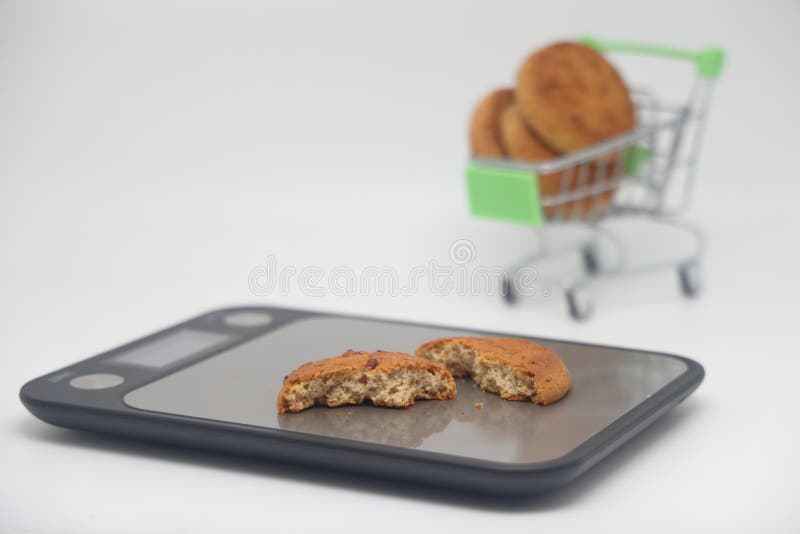 A Pack of Cookies on an Electronic Kitchen Scale, Accurate Calorie ...