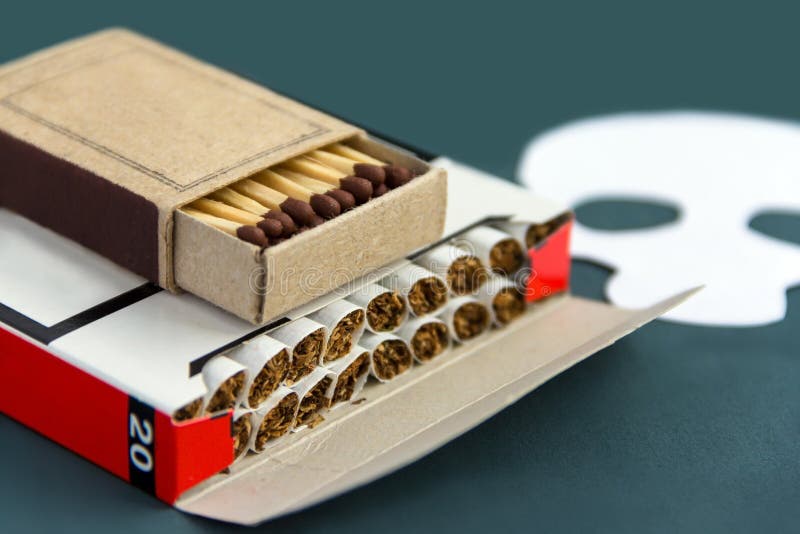 A Pack of Filter-free Cigarettes and a Box of Matches. Retro. Stock ...