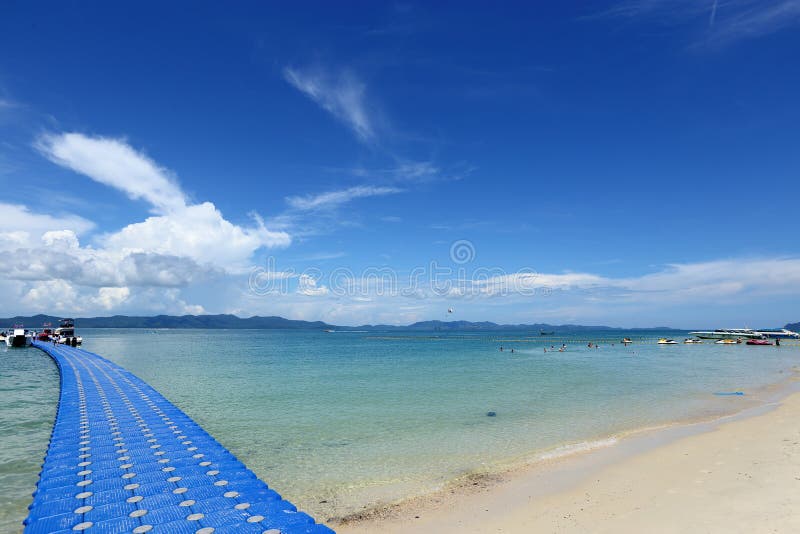Pack Group of Blue Cubes Float on Clear Ocean Beautiful Beach for ...