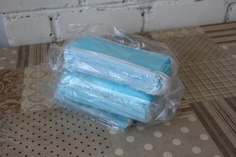 Pack of Medical Masks on a Table Stock Image - Image of medical, order ...