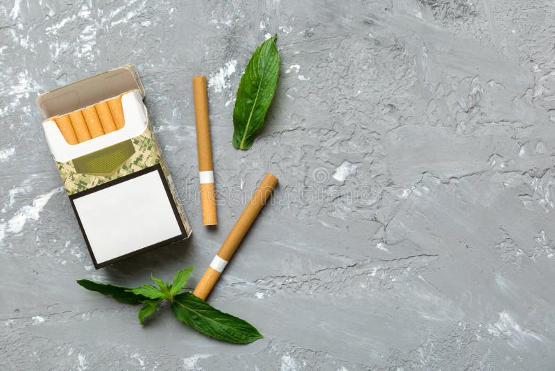 Pack of Menthol Cigarettes and Fresh Mint on Colored Table, Menthol ...