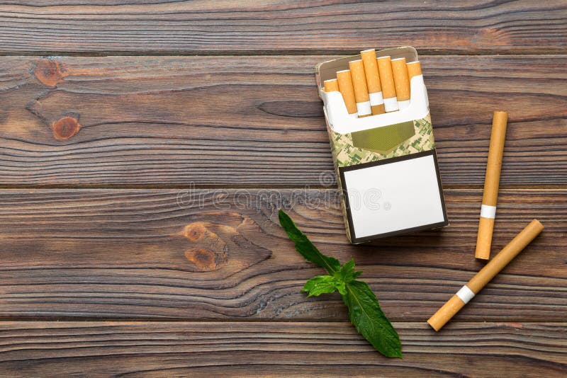 Pack of Menthol Cigarettes and Fresh Mint on Colored Table, Menthol ...