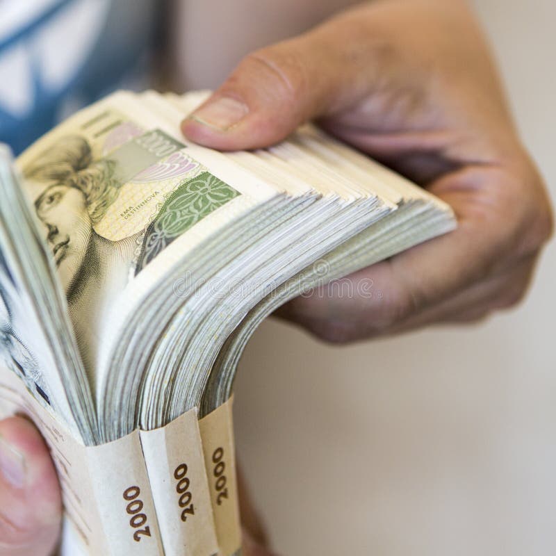 Pack of Money - Big Pile of Banknotes in Hand Stock Image - Image of ...