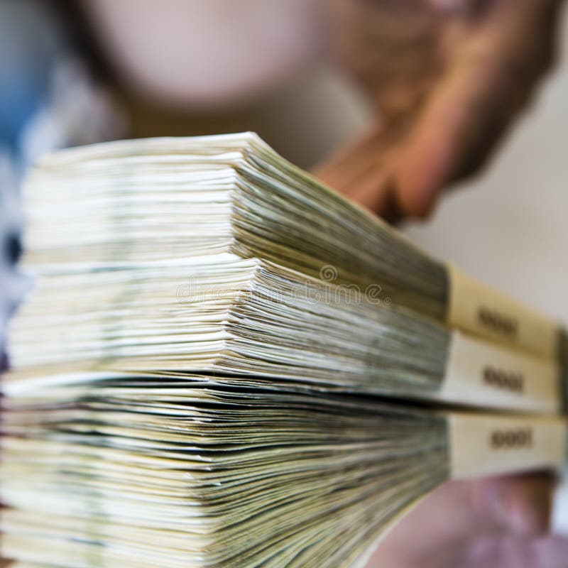 Pack of Money - Big Pile of Banknotes in Hand Stock Photo - Image of ...