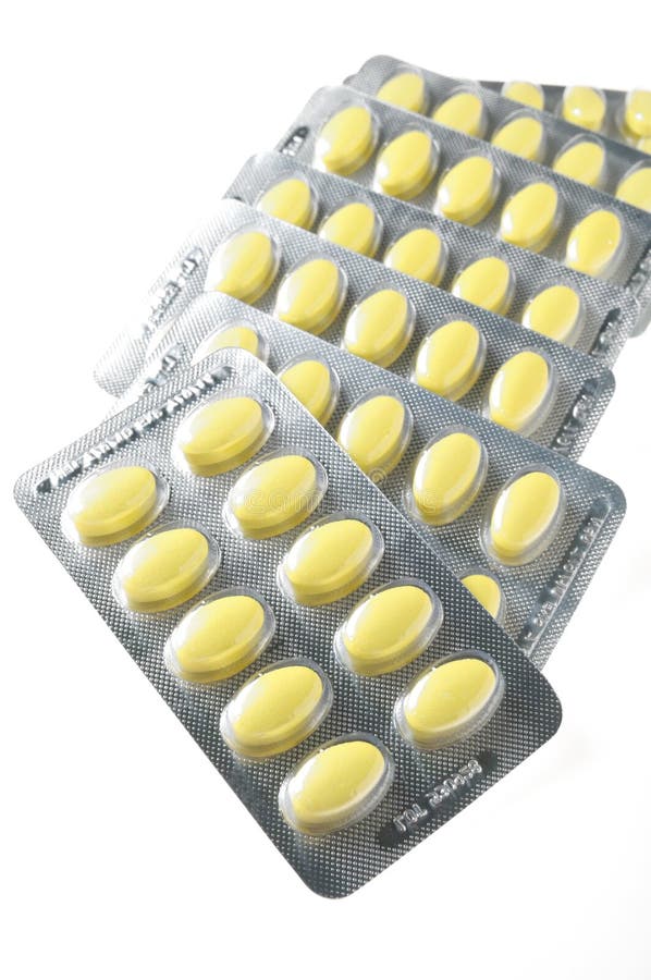 Pack of yellow pills stock image. Image of capsule, drug - 17191789