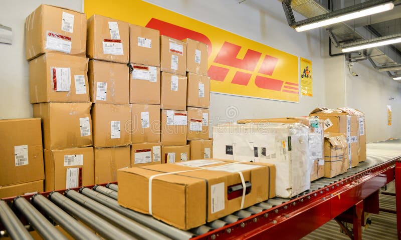 Package Boxes for Delivery in the DHL Storehouse Editorial Image ...