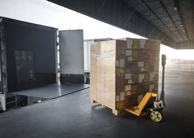 Boxes on hand pallet truck stock image. Image of industrial - 11456479