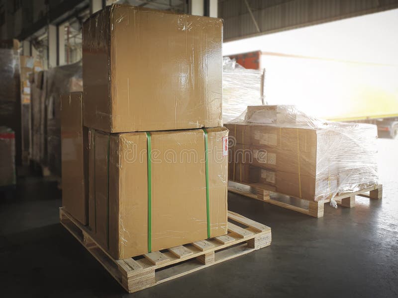 Package Boxes Load with Cargo Container. Trailer Truck Parked Loading ...