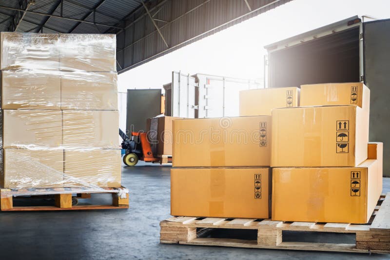 Package Boxes Stack on Wooden Pallets Loading into Container Trucks ...