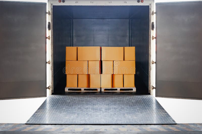 Package Boxes Stacked on Pallets Loading into Cargo Container ...