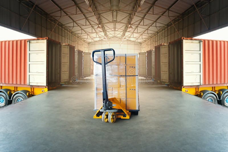 Package Boxes Wrapped Plastic on Pallets with Hand Pallet Jack. Loading ...