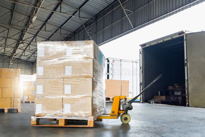 Package Boxes Wrapped Plastic on Pallets Loading into Cargo Container ...