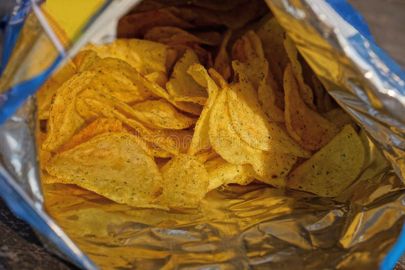 Package with a Bunch of Dry Yellow Chips Stock Photo - Image of layout ...