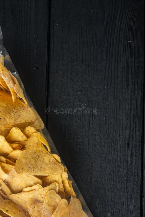 Package Corn Chips, on Black Wooden Background, Top View or Flat Lay ...