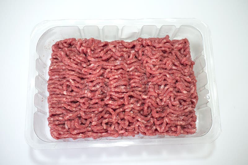 Package With Fresh Minced Meat Over A White Background Stock Photo ...