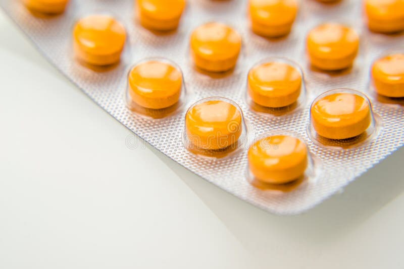 A Package of Orange Tablets Stock Image - Image of illness ...