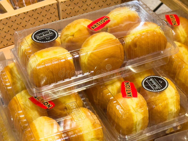 Packaged Brioche Bread Rolls in Plastic Container with Sale Label ...