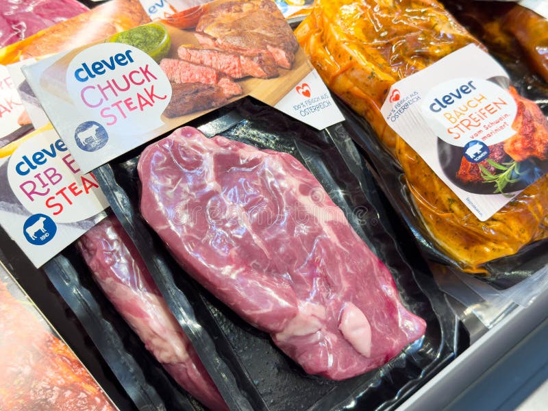 Packaged Chuck Steak and Marinated Beef Products in Supermarket Display ...