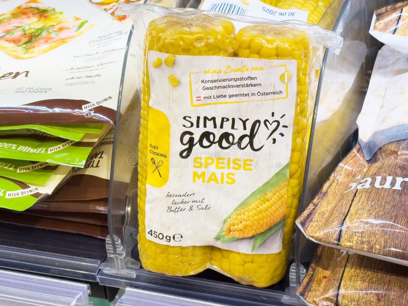 Packaged Corn on the Cob in Grocery Store Display with Product Labeling ...
